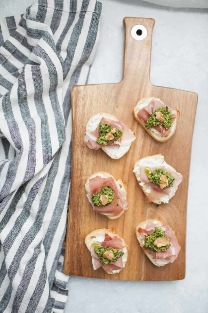 Pesto Crostini with Prosciutto (Easy Italian Appetizer) - Joyfully Mad
